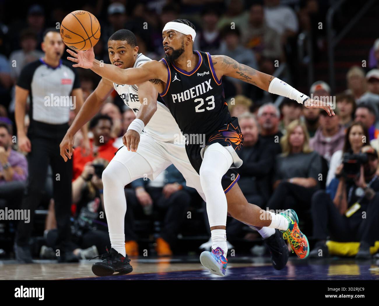 Phoenix Suns guard Jordan Goodwin (23) and San Antonio Spurs forward ...