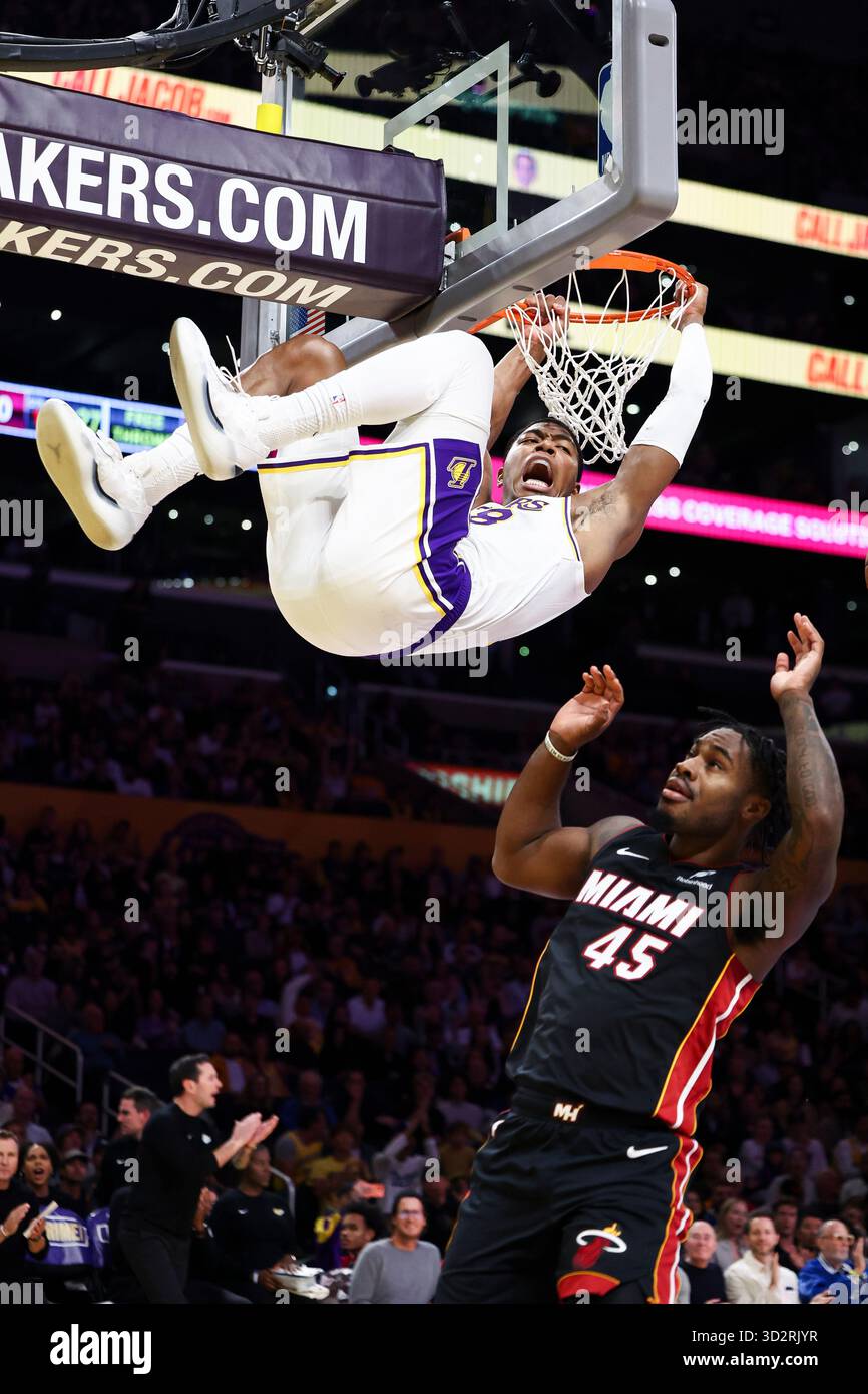 Los Angeles Lakers forward Rui Hachimura, top left, reacts after ...
