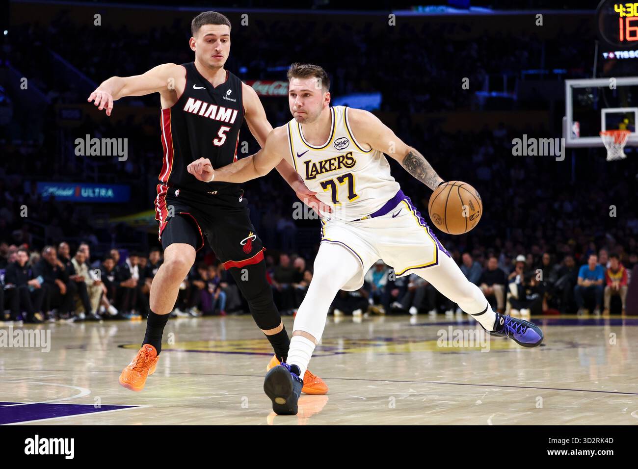 Los Angeles Lakers guard Luka Doncic (77) drives against Miami Heat ...