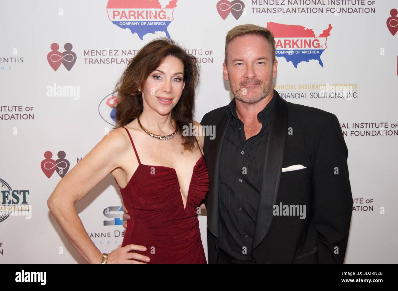 Kristina Dukes and Christopher M. Dukes attend the MNITF Holiday Gala ...