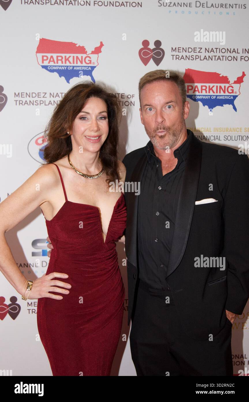 Kristina Dukes and Christopher M. Dukes attend the MNITF Holiday Gala ...