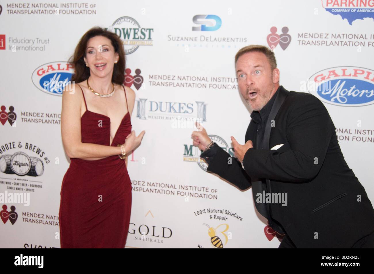 Kristina Dukes and Christopher M. Dukes attend the MNITF Holiday Gala ...
