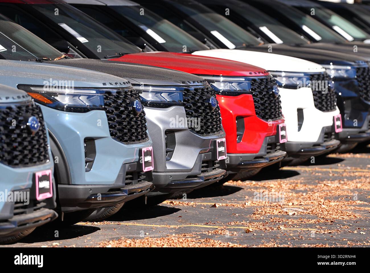 Unsold 2026 Explorer utility vehicles sit on the lot of a Ford ...
