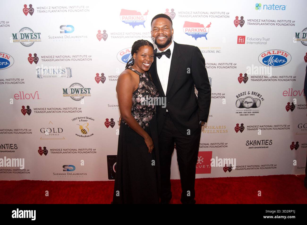 Alverta Jentimane and Ehis Inekhomon attend the MNITF Holiday Gala at ...