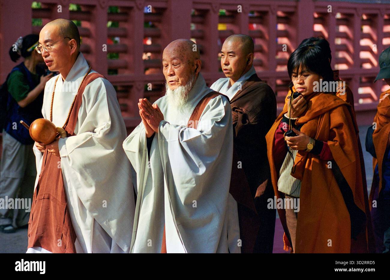 Japanese Buddhist Monks walk mindfully towards the entrance of the ...