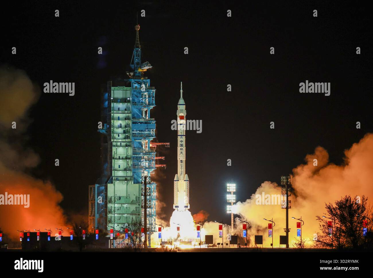 The Shenzhou XXI crewed spaceship, atop a Long March 2F carrier rocket ...