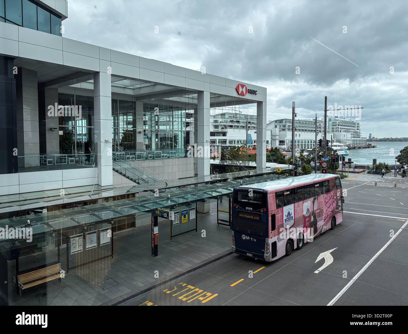 Modern HSBC building and bus stop with a double-decker bus in downtown ...