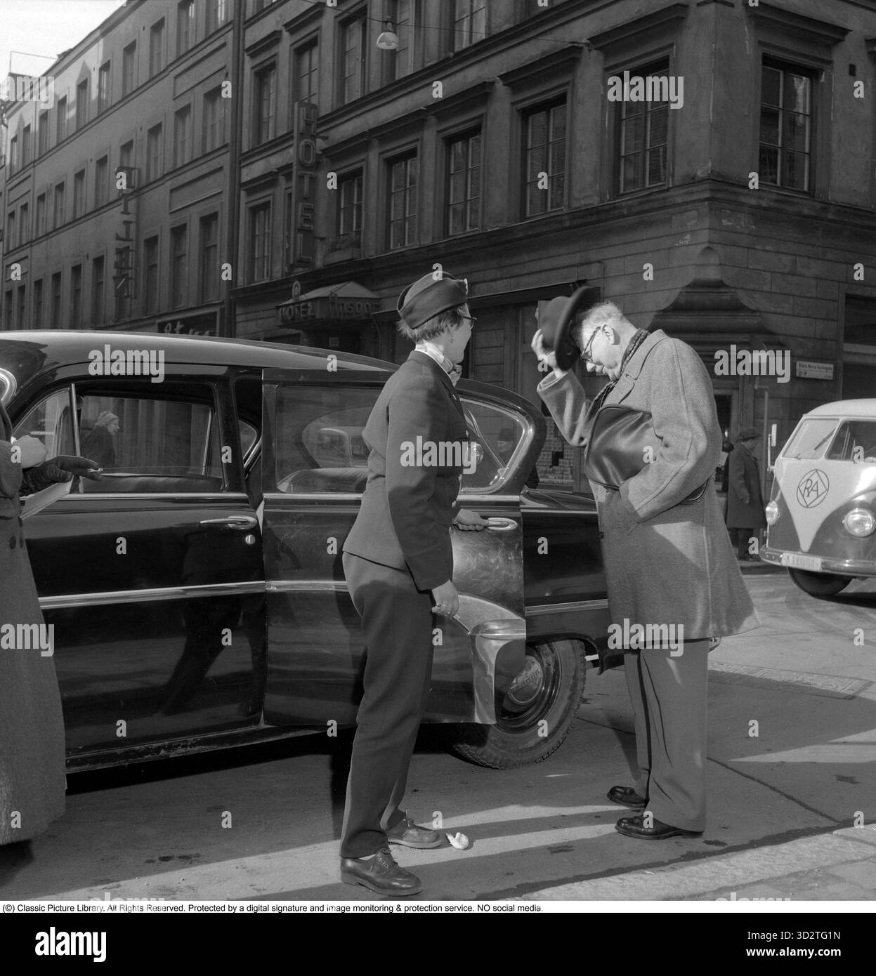 The female taxi driver, Harriet Jonsson, opens the car door as the male ...