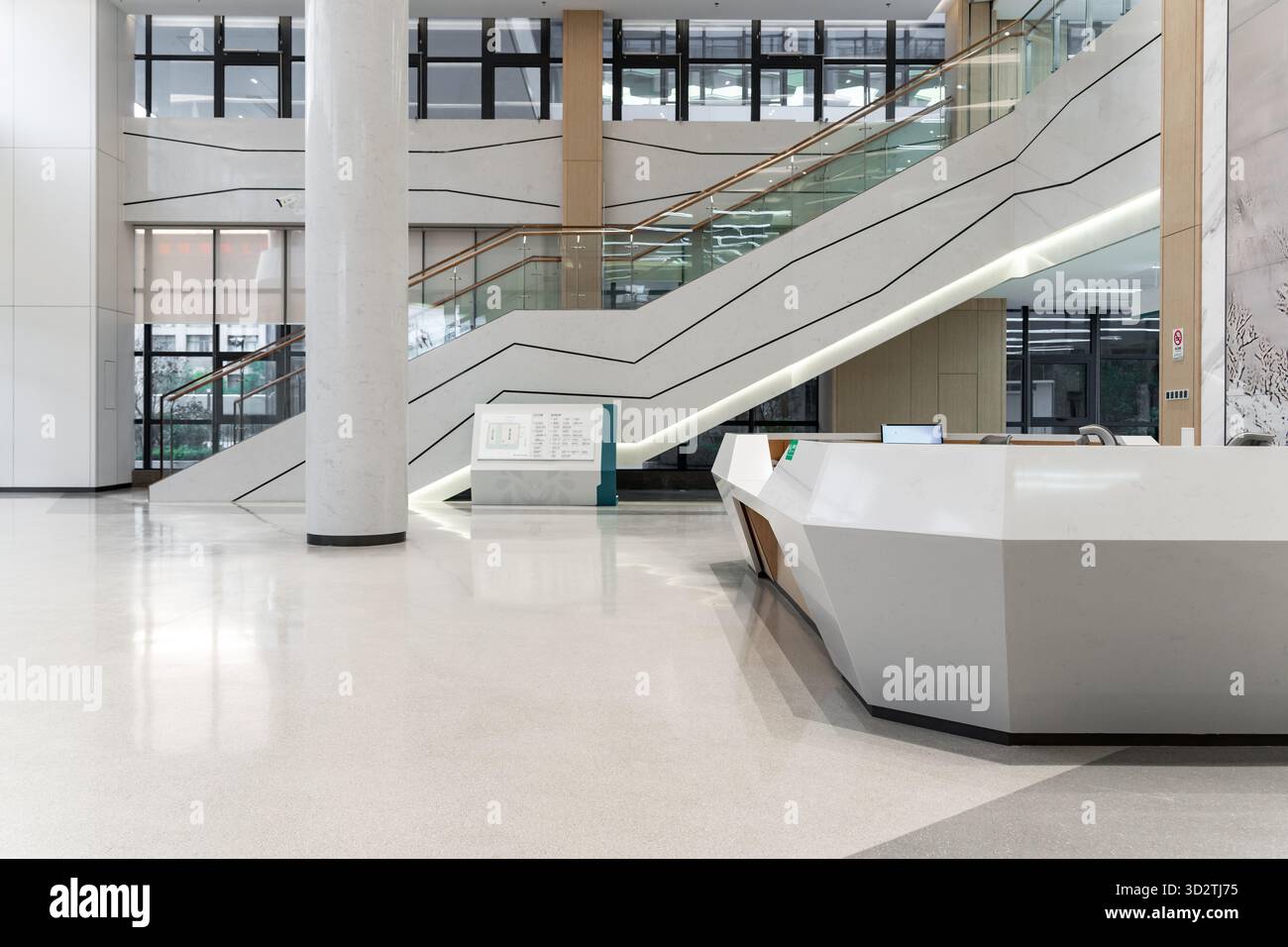 modern hospital lobby with a staircase and reception desk Stock Photo ...