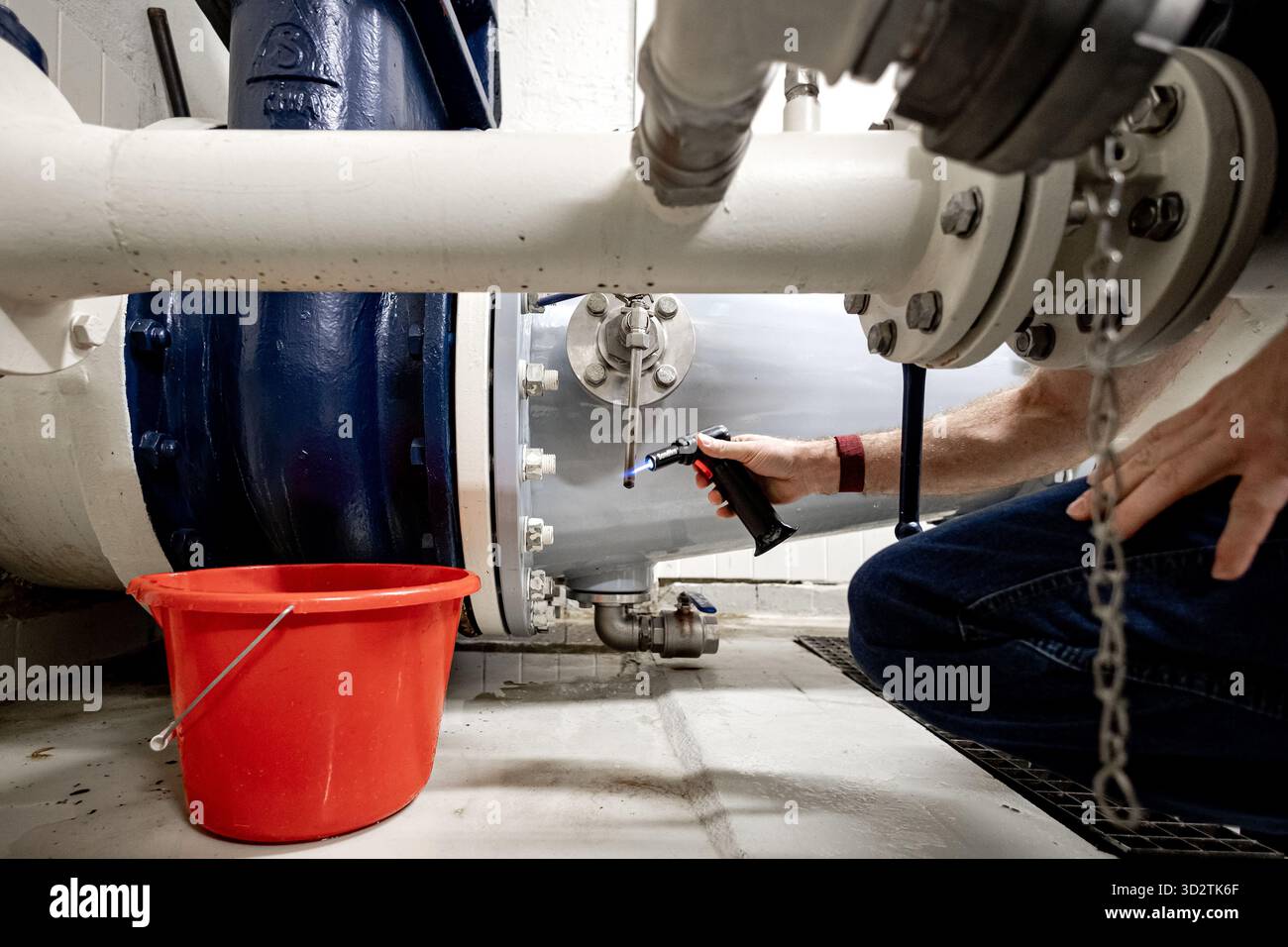 UTRECHT - An employee of drinking water company Vitens takes a water ...