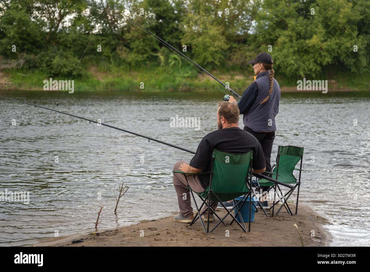 Young couple enjoying relaxing fishing hi-res stock photography and ...