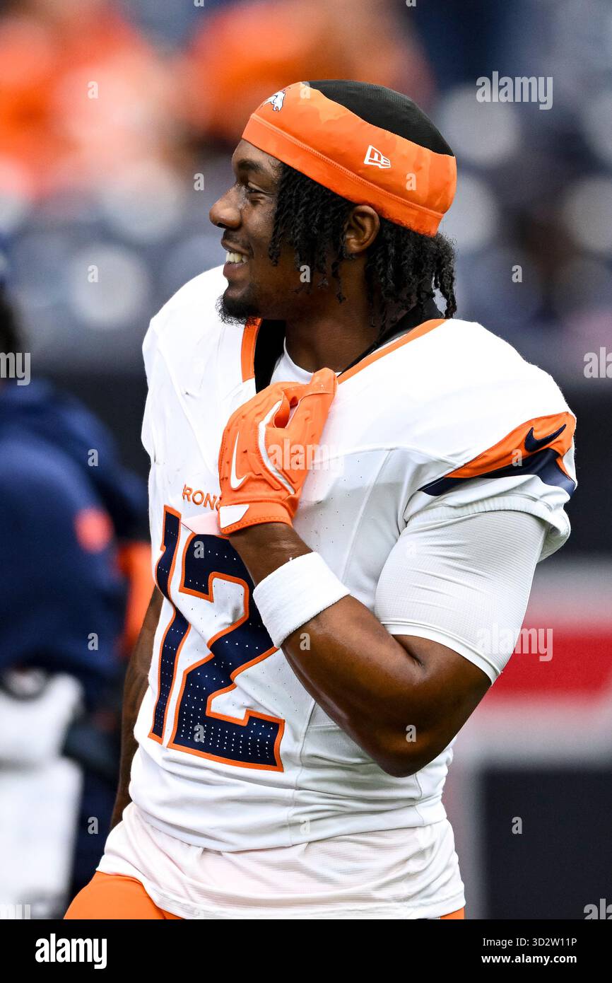 Denver Broncos running back RJ Harvey (12) reacts during warm ups prior ...
