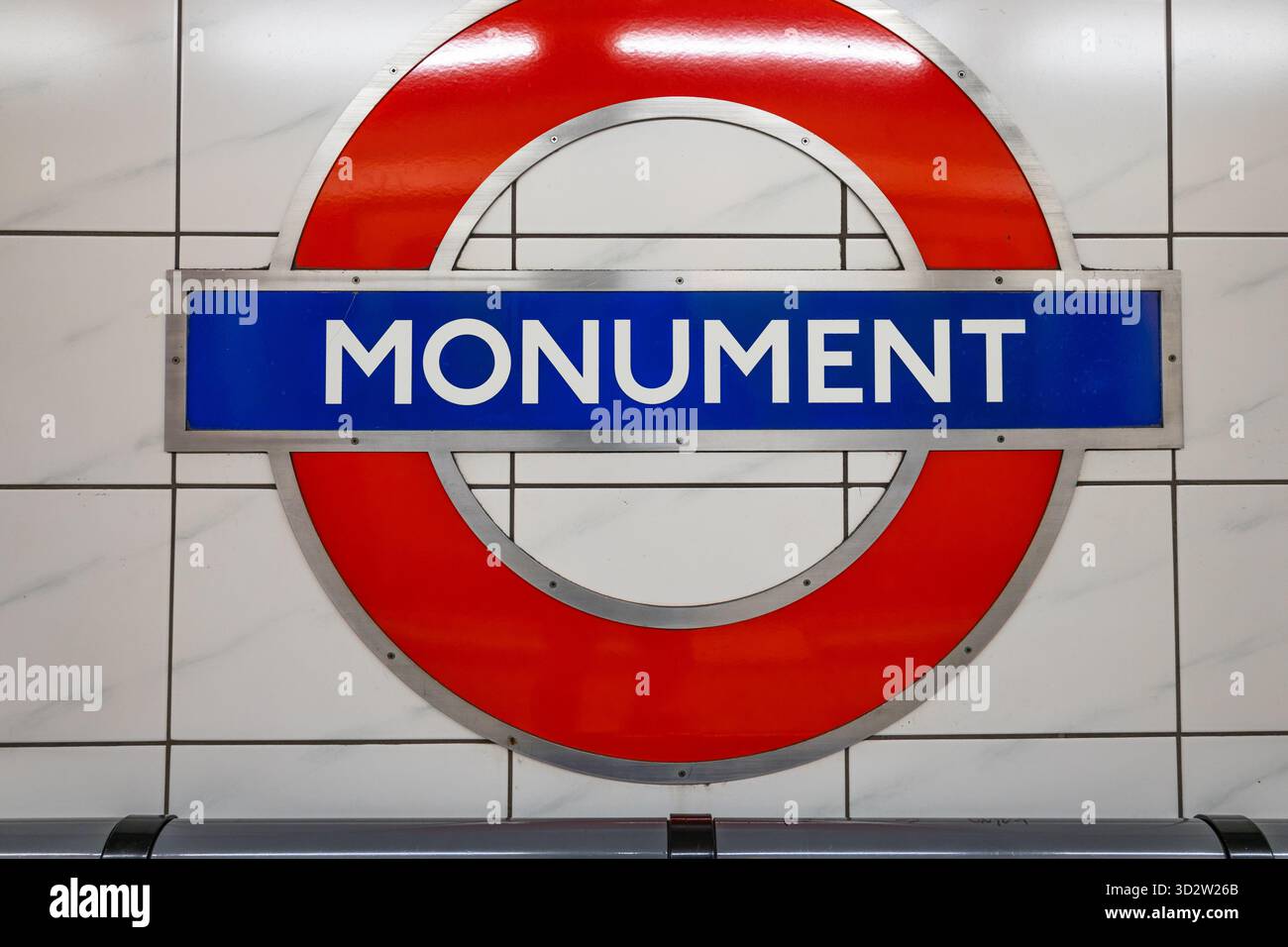 Monument Tube station sign, the classic red and blue roundel of London ...