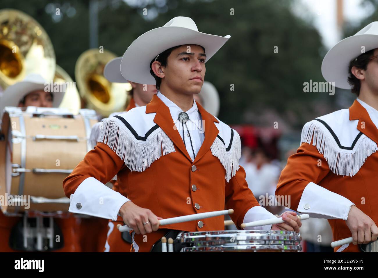 AUSTIN, TX - NOVEMBER 01: A University of Texas drummer heads into the ...