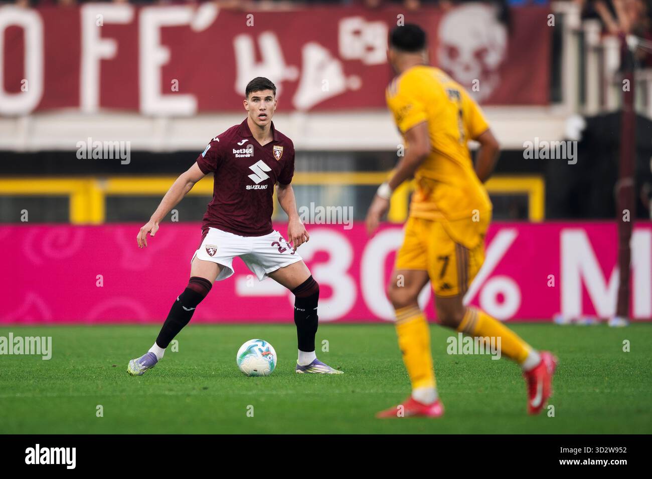 Cesare Casadei of Torino FC is challenged by Mehdi Leris of Pisa SC during the Serie A football ...