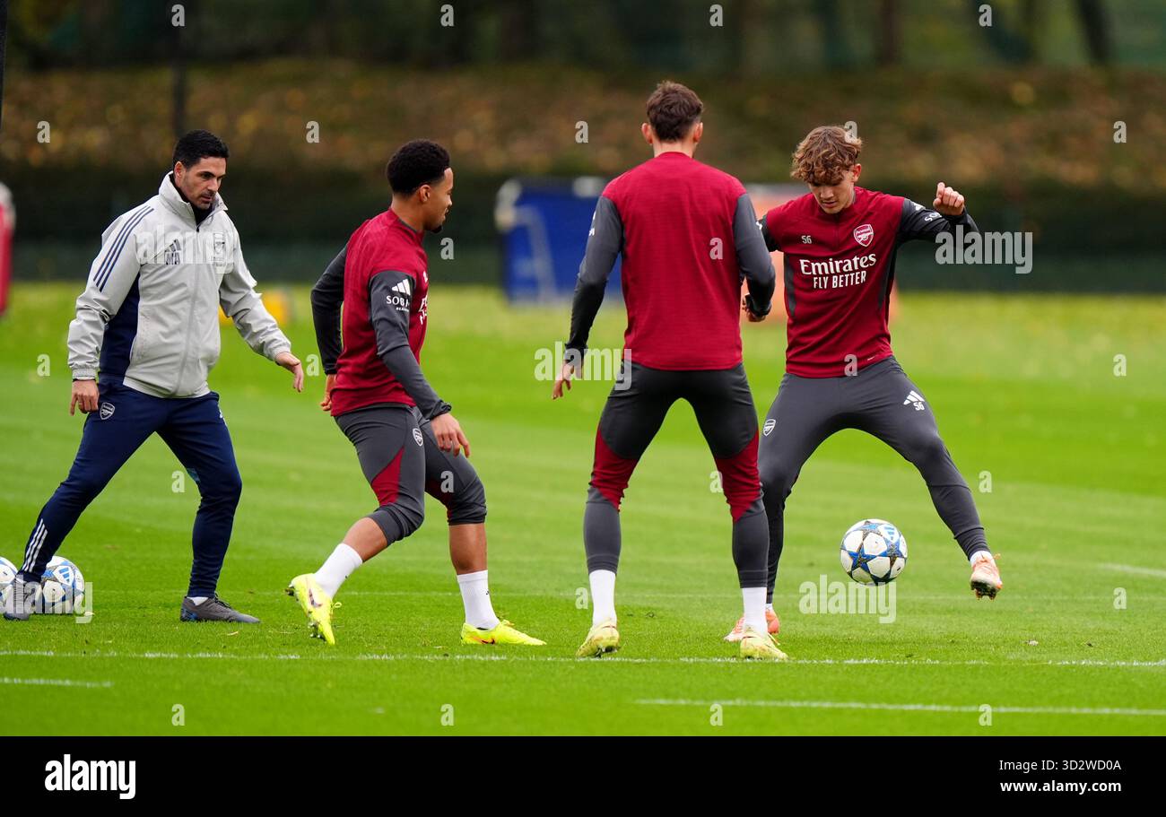 Arsenal's Max Dowman (right) and manager Mikel Arteta (left) during a ...