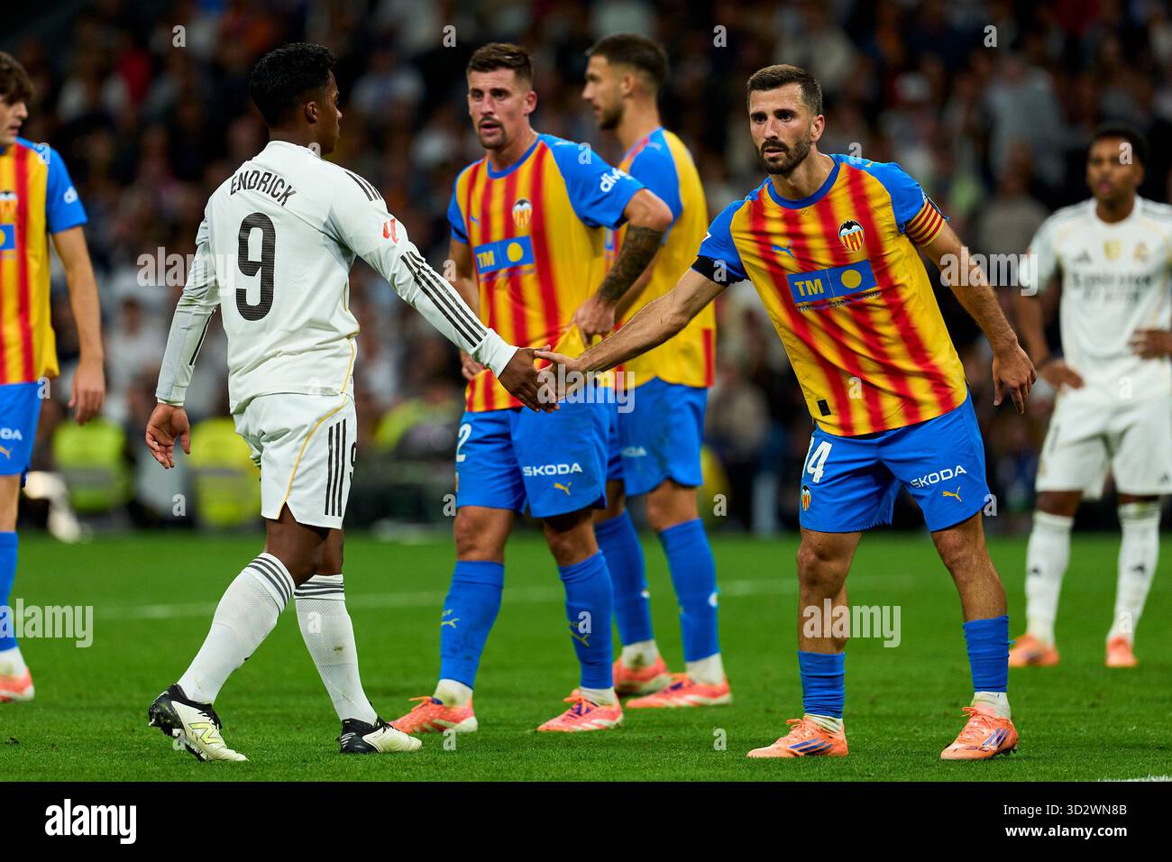 Endrick of Real Madrid CF and Jose Gaya of Valencia CF during the ...