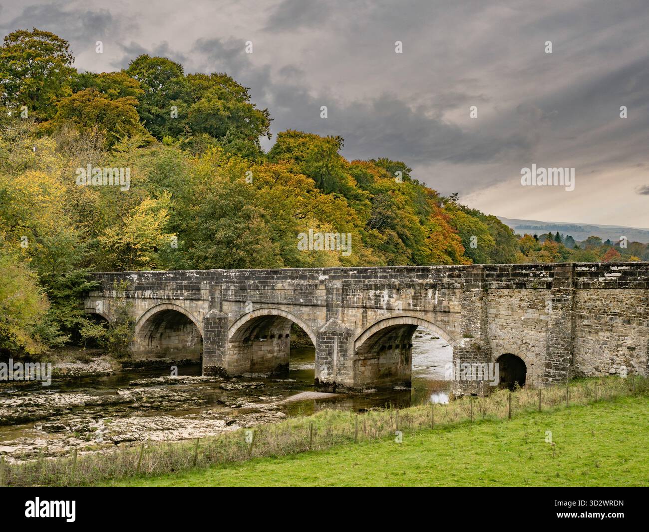 Historic stone bridge crossing the River Wharfe at Grassington, North ...