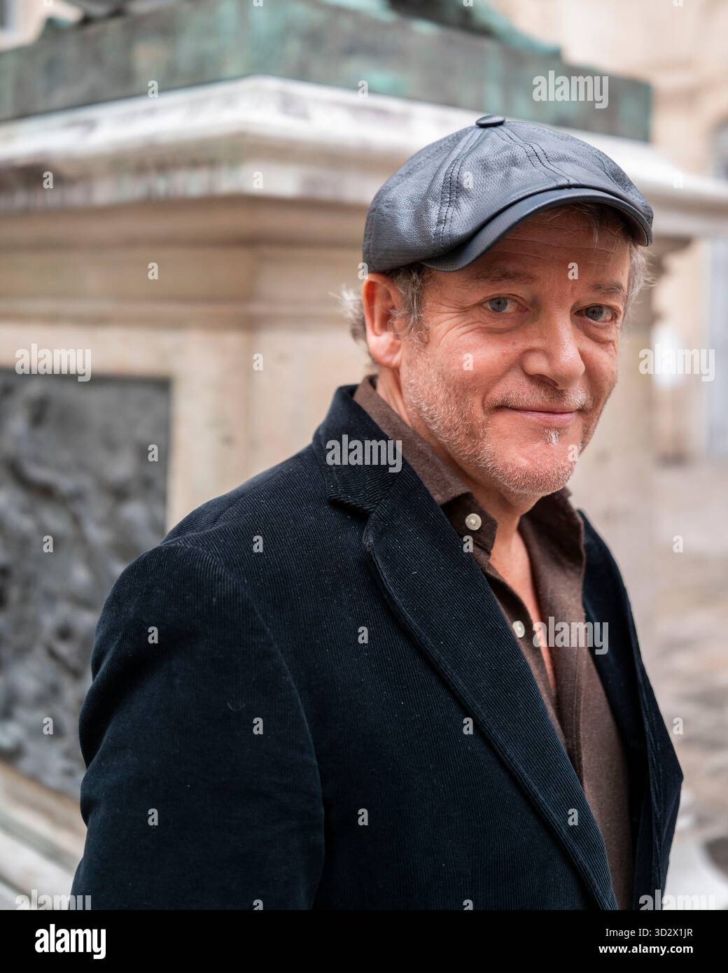 French journalist and writer Marc Weitzmann poses after receiving the ...