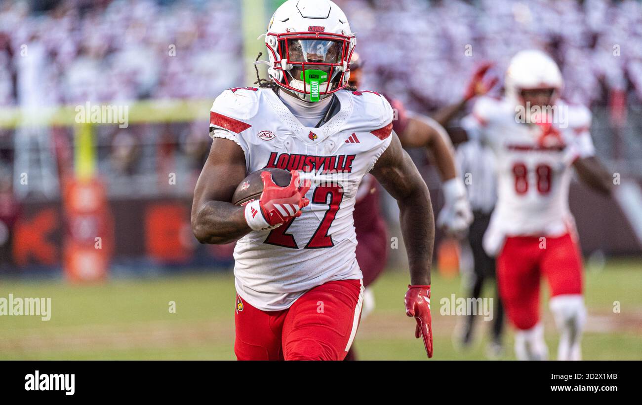 Louisville running back Keyjuan Brown (22) runs for a touchdown against Virginia Tech during the ...