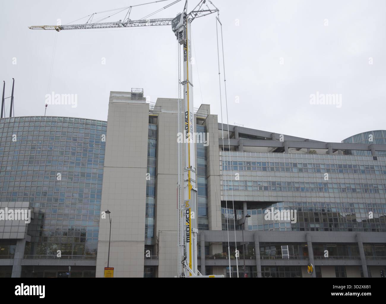 PARIS, France – November 03, 2025: A construction crane towers over the ...