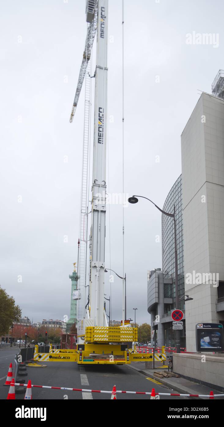 PARIS, France – November 03, 2025: A construction crane towers over the ...