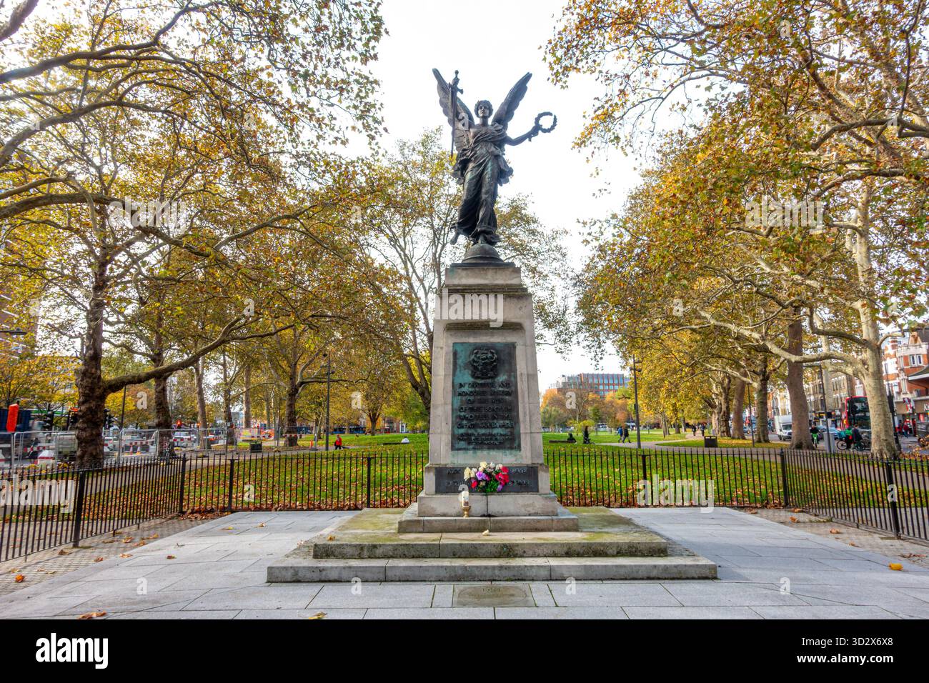 The war memorial at Shepherds Bush Green in London, UK seen in autumn ...
