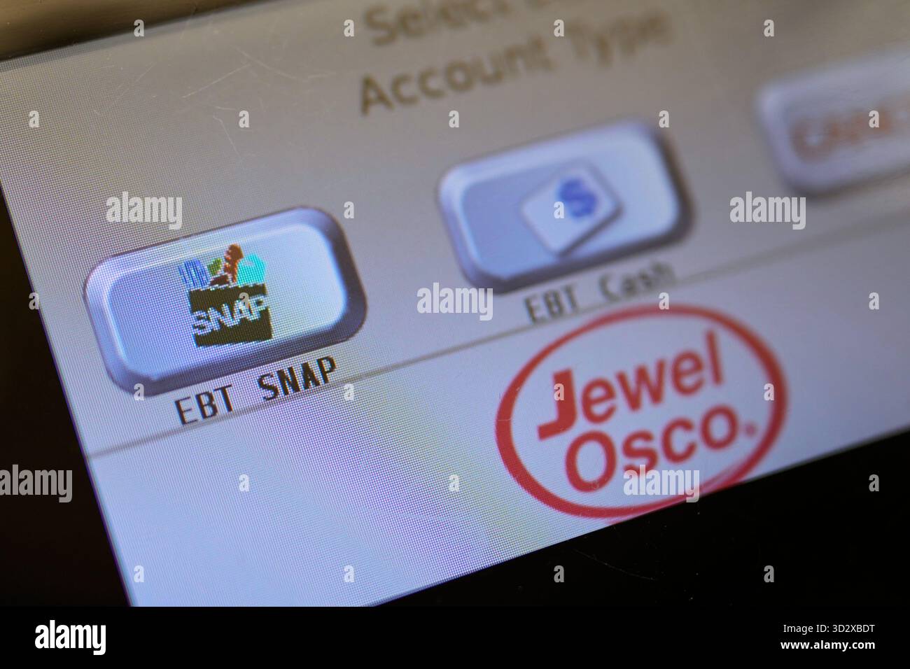 An EBT SNAP sign is shown on a self check out screen at a grocery store ...