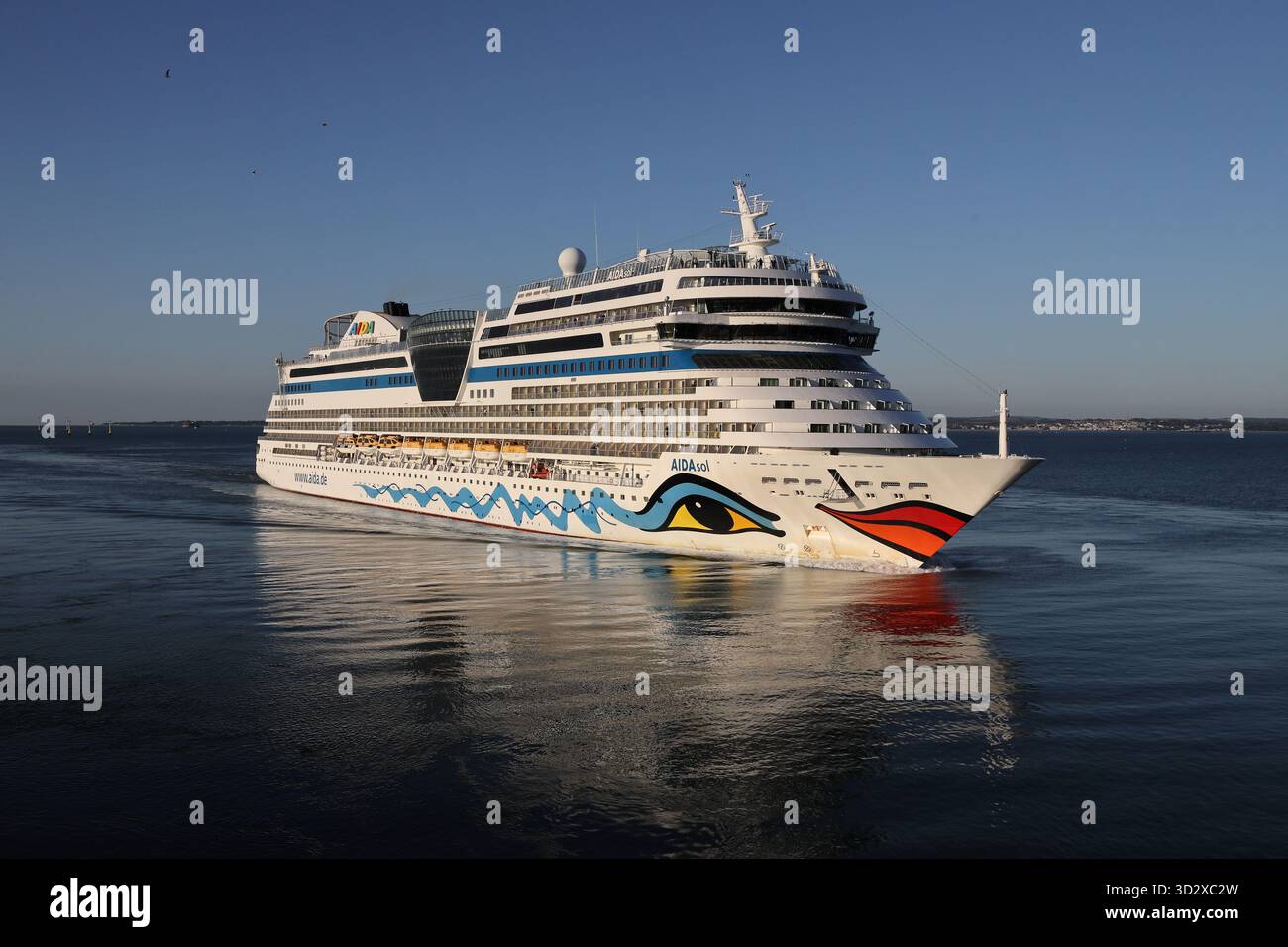 The cruise ship MS AIDASOL about to enter harbour. The early morning ...