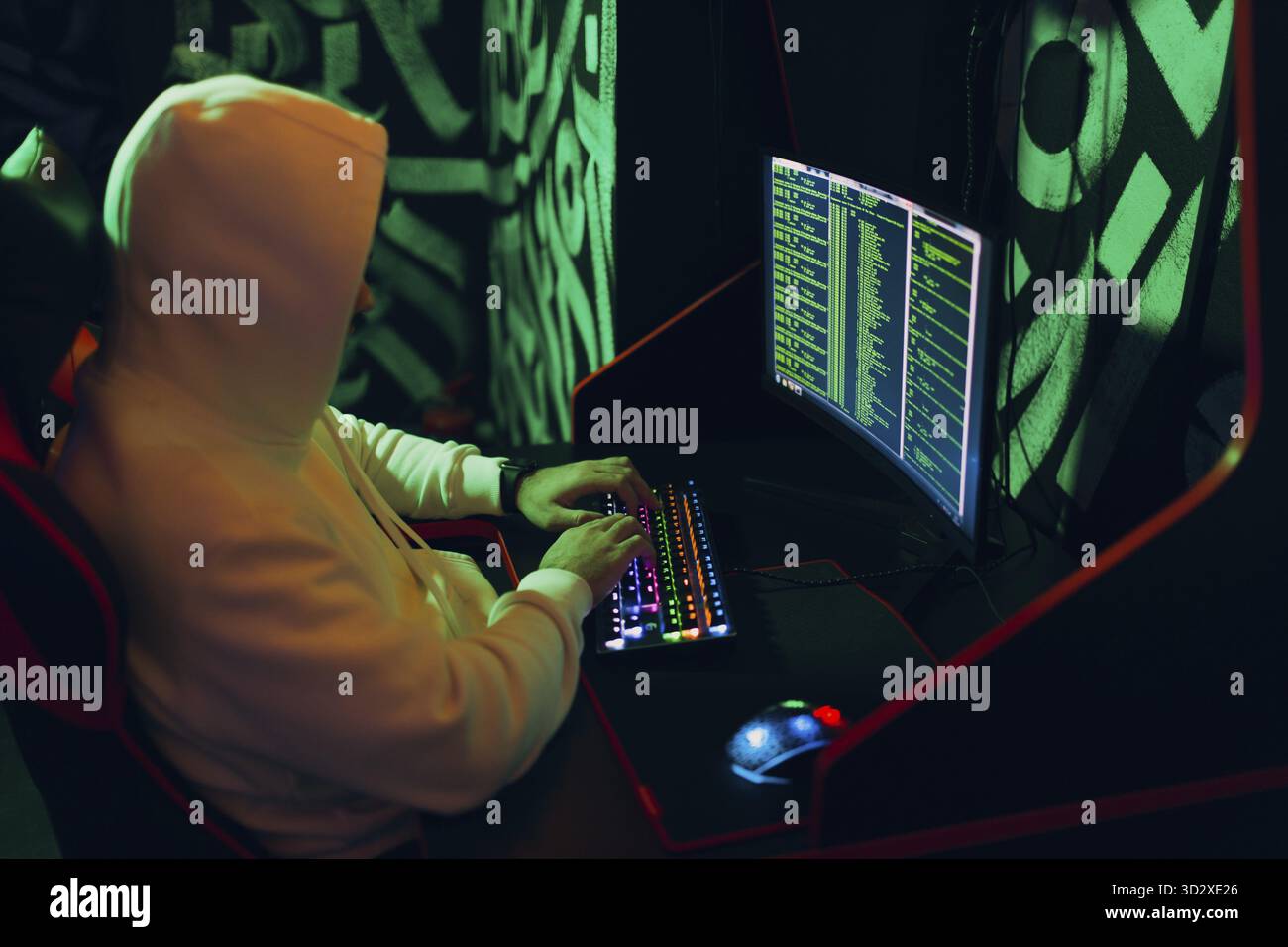 Hacker using computer malware software and hacking binary code green ...