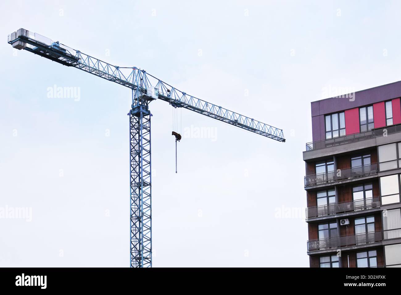 Tower crane at a construction site for a new residential building ...