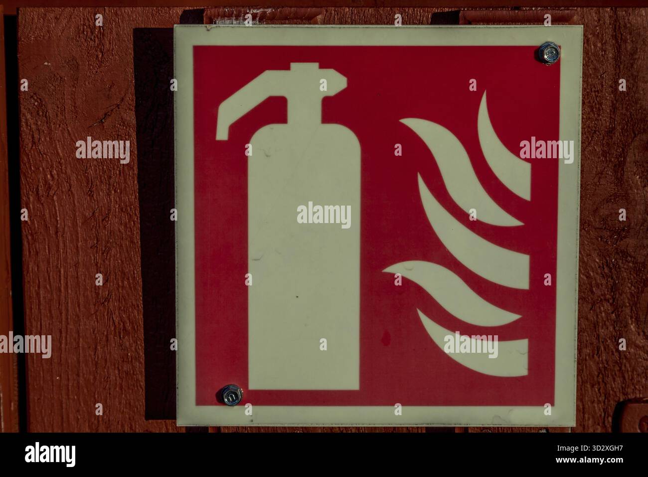 Fire extinguisher sign, red and white sign on a red wooden wall. Red ...