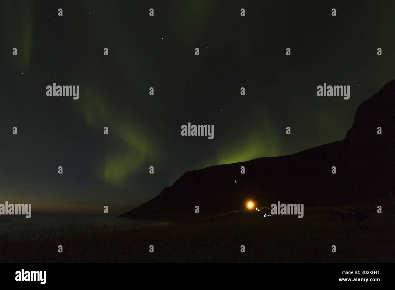 Northern lights. Unstad Beach in Lofoten Islands in Norway, surfers ...