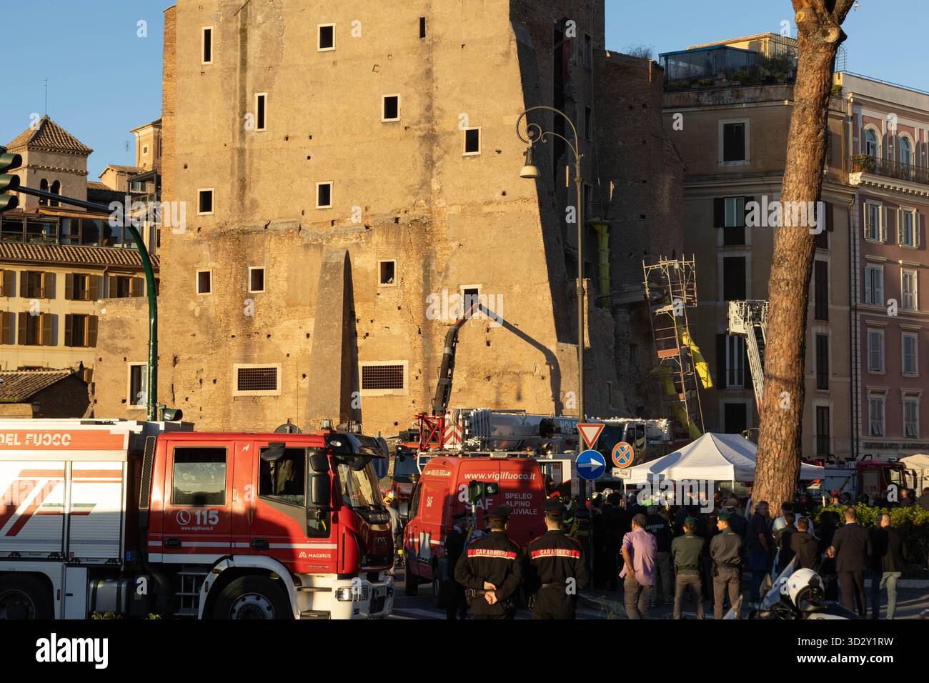Firefighters try to save the worker who remained inside the Torre dei ...