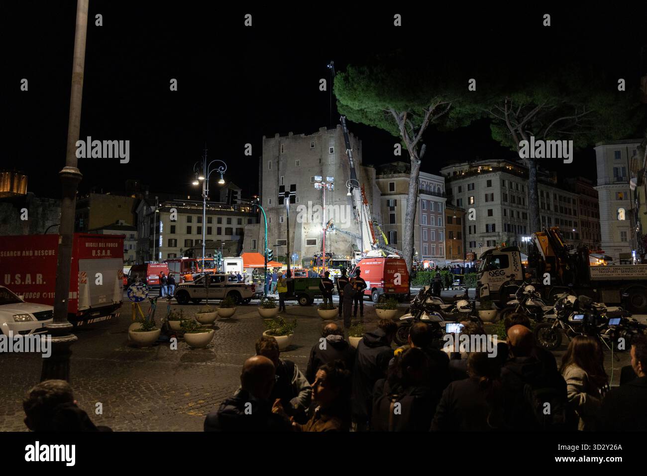 Firefighters try to save the worker who remained inside the Torre dei ...