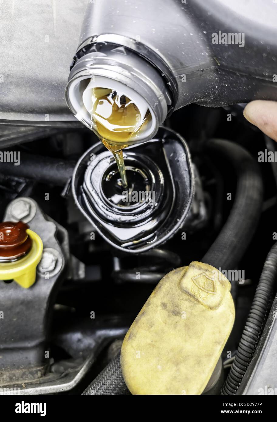 Car mechanic filling fresh hi-res stock photography and images - Alamy