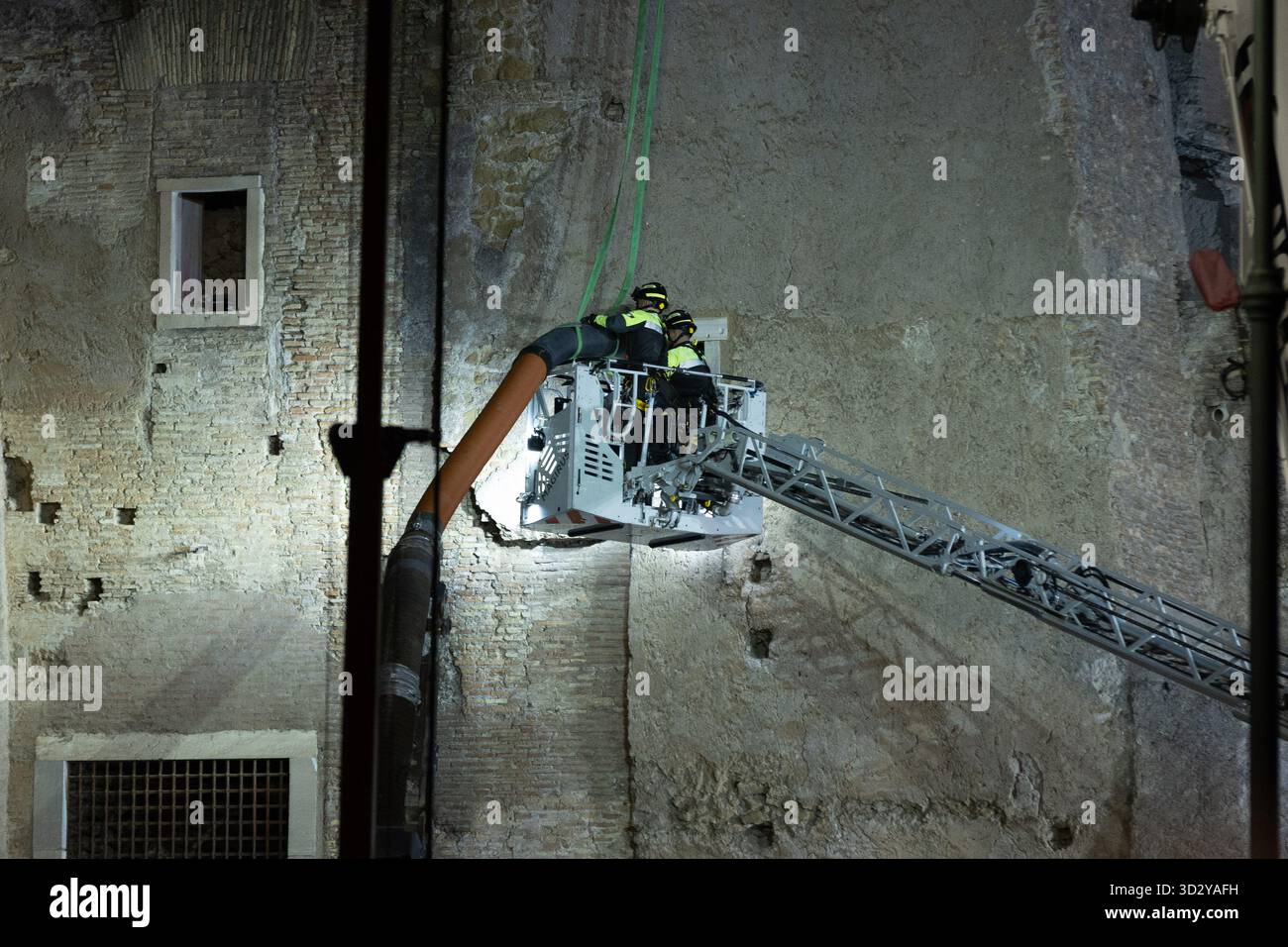 Firefighters try to save the worker who remained inside the Torre dei ...