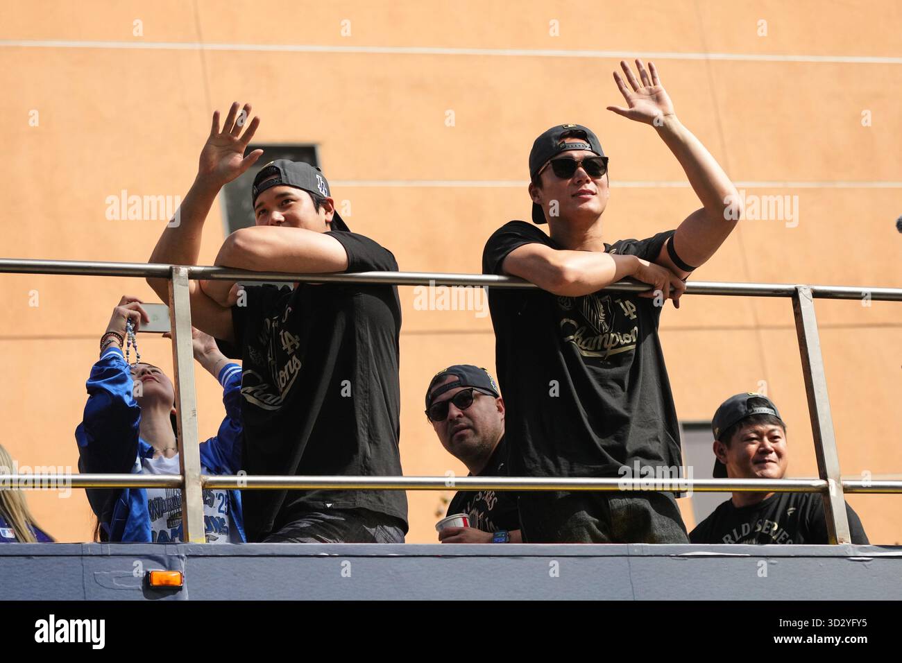 Los Angels Dodgers' Shohei Ohtani, left, and Yoshinobu Yamamoto wave ...