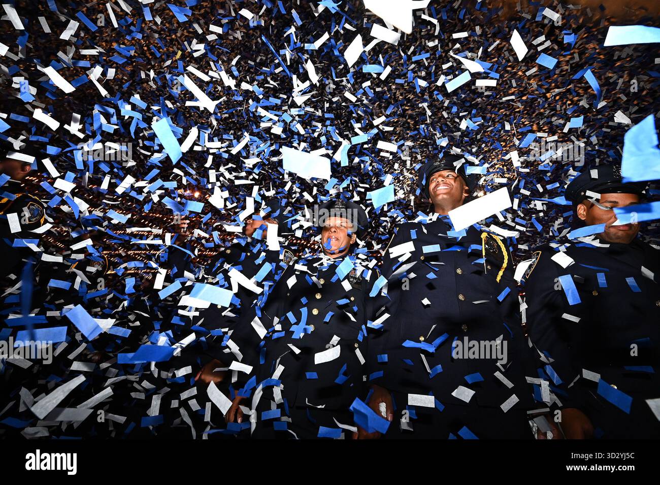 Confetti falls around newly sworn in NYPD officers during New York City ...