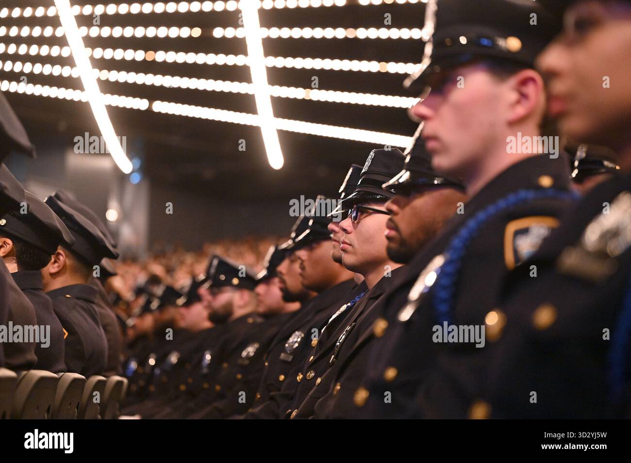 Members of a class of 462 NYPD cadets attend the City Police Academy ...