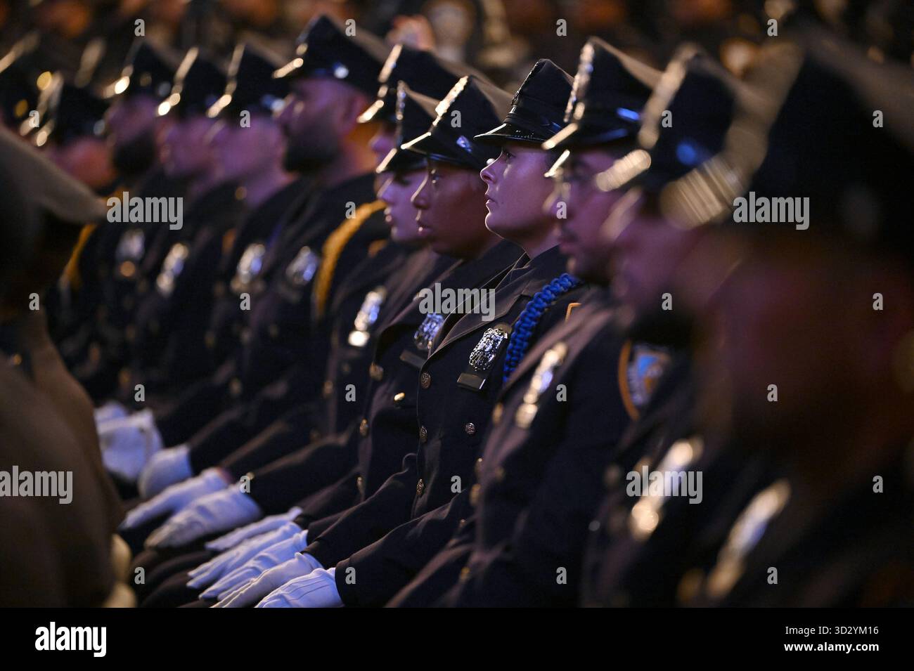 Members of a class of 462 NYPD cadets attend the City Police Academy ...