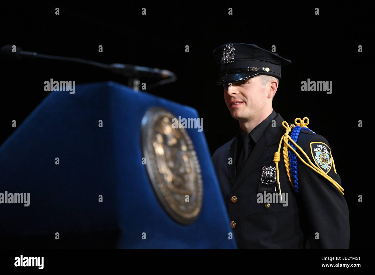 Class Valedictorian Officer Patrick Smyth prepares to speak at the New York City Police Academy ...