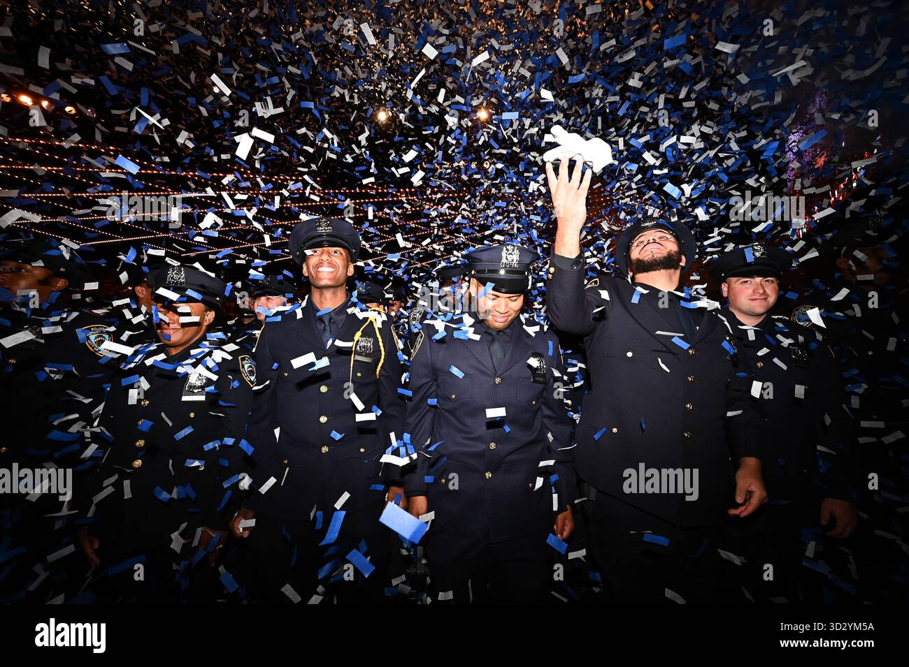 Confetti falls around newly sworn in NYPD officers during New York City ...