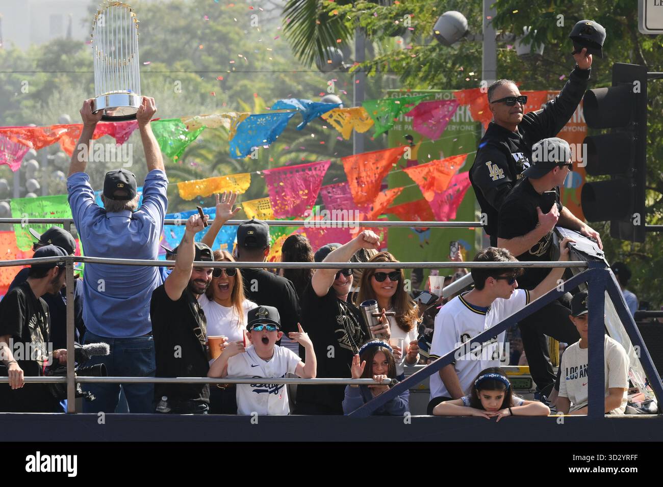 Los Angeles Dodgers players, family and staff ride on top of double ...
