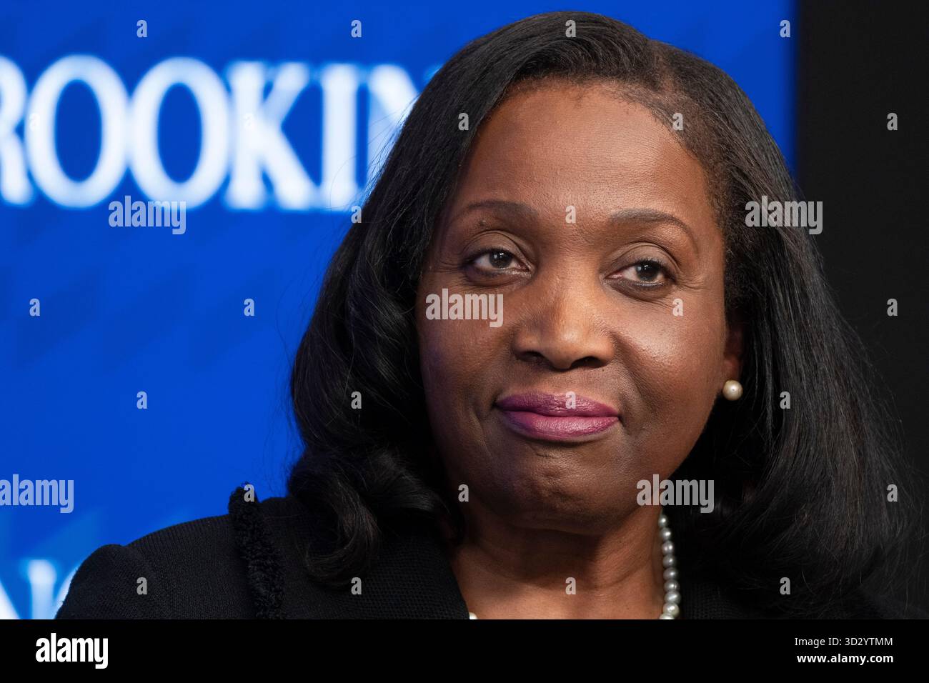 Lisa Cook, a Federal Reserve Board of Governors member, reacts during ...