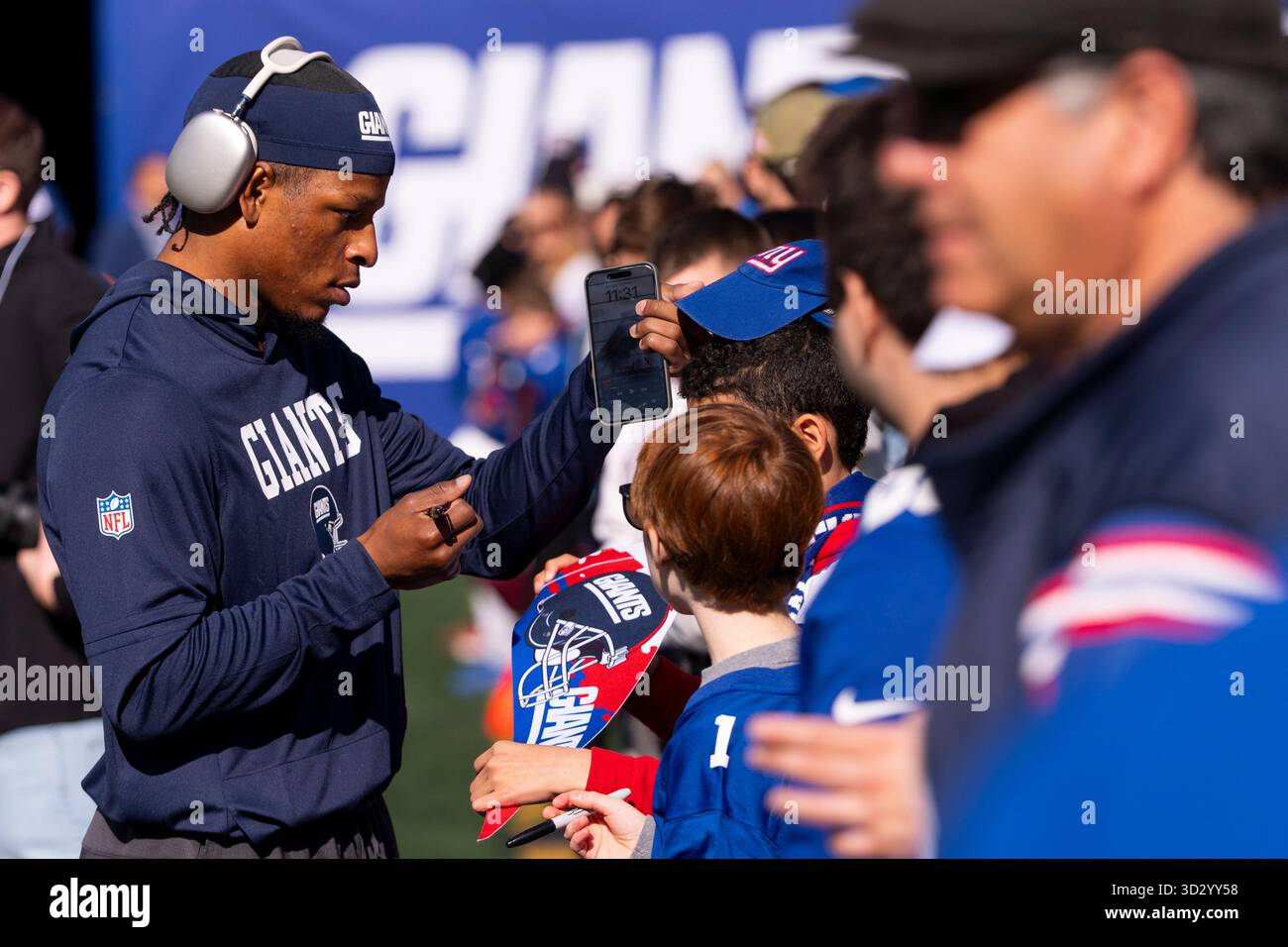 New York Giants corner back Dru Phillips (22) interacts with fans prior ...