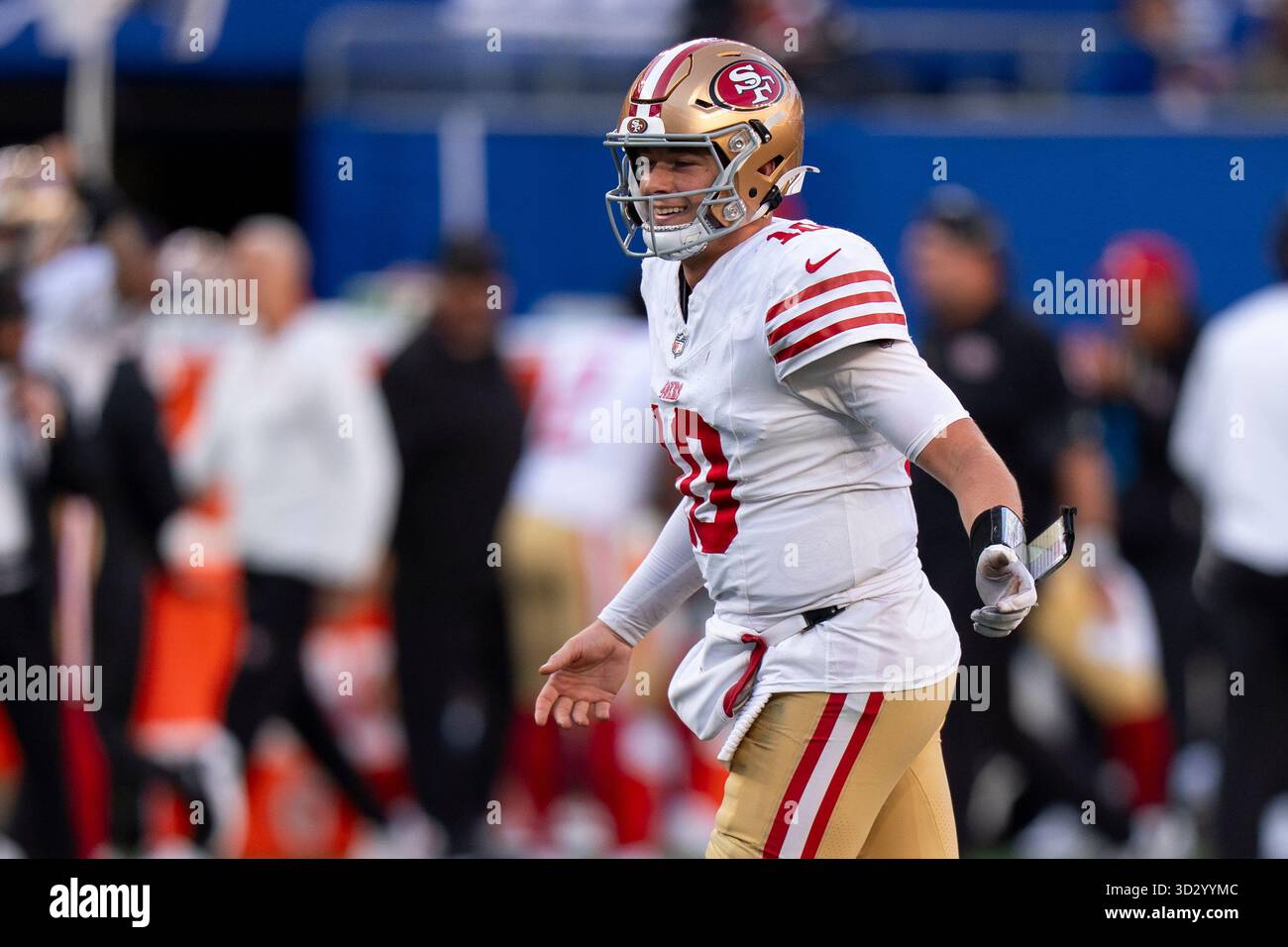 San Francisco 49ers quarterback Mac Jones (10) ireacts to the touchdown ...