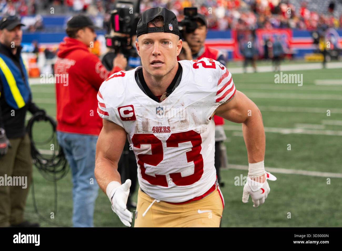 San Francisco 49ers running back Christian McCaffrey (23) heads off the ...
