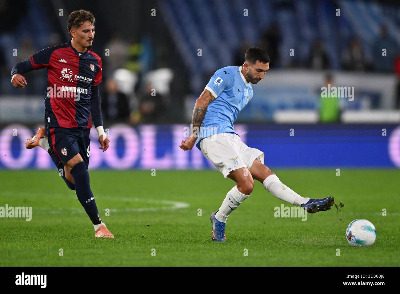 Sebastiano Esposito of Cagliari Calcio and Danilo Cataldi of S.S. Lazio ...