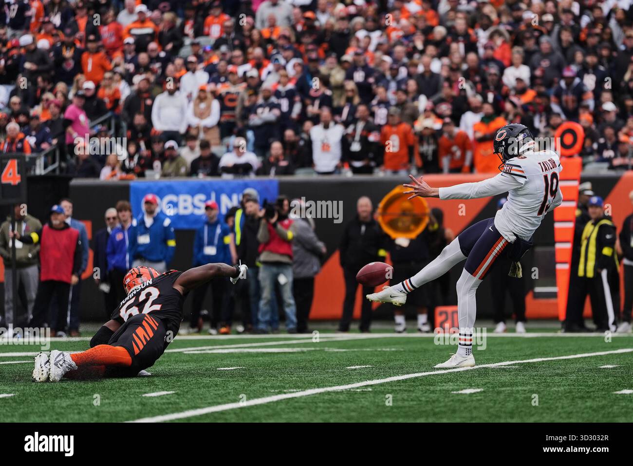 Chicago Bears punter Tory Taylor (19) punts as Cincinnati Bengals ...